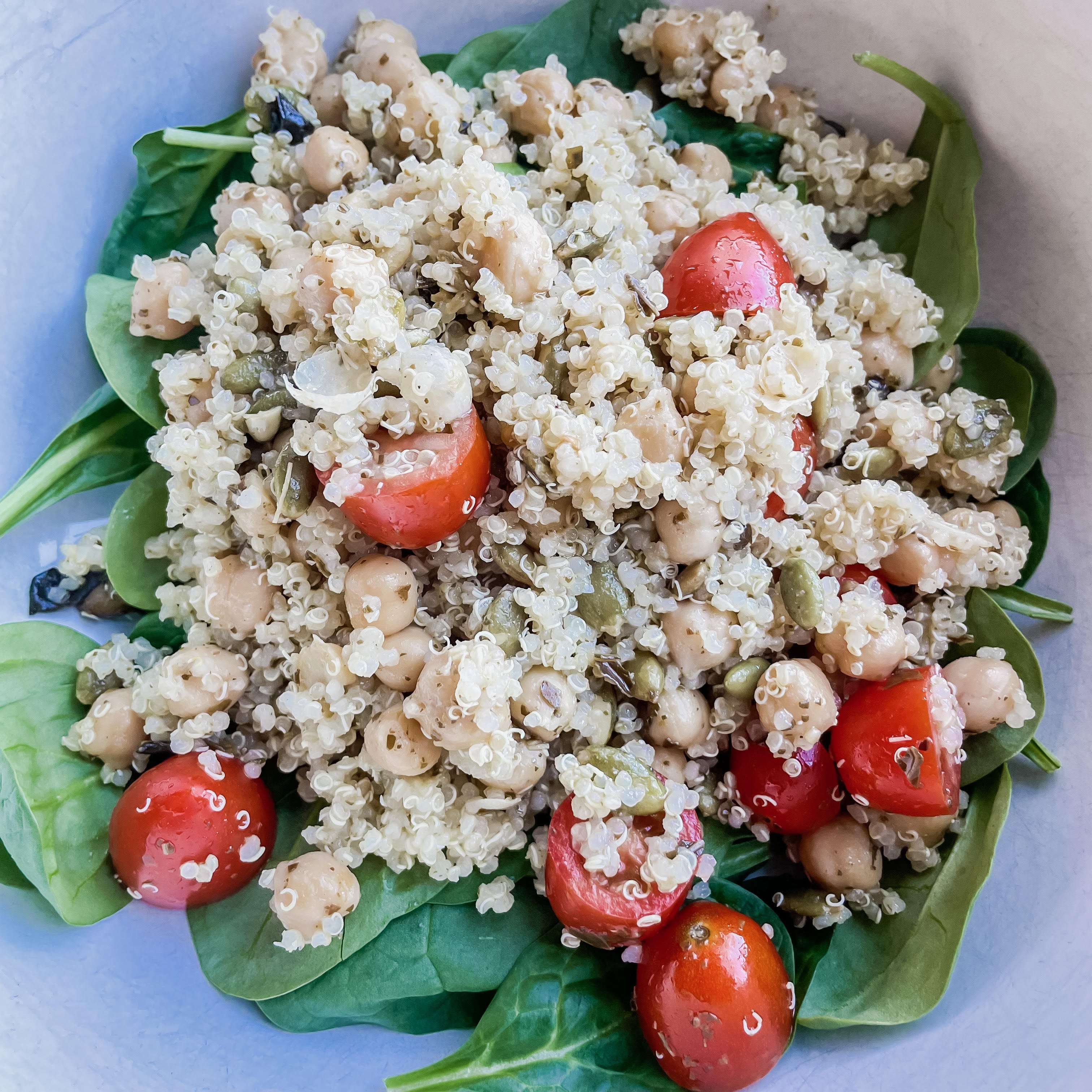 Pesto Chickpea Salad over Spinach – Brittany Jones Nutrition Group